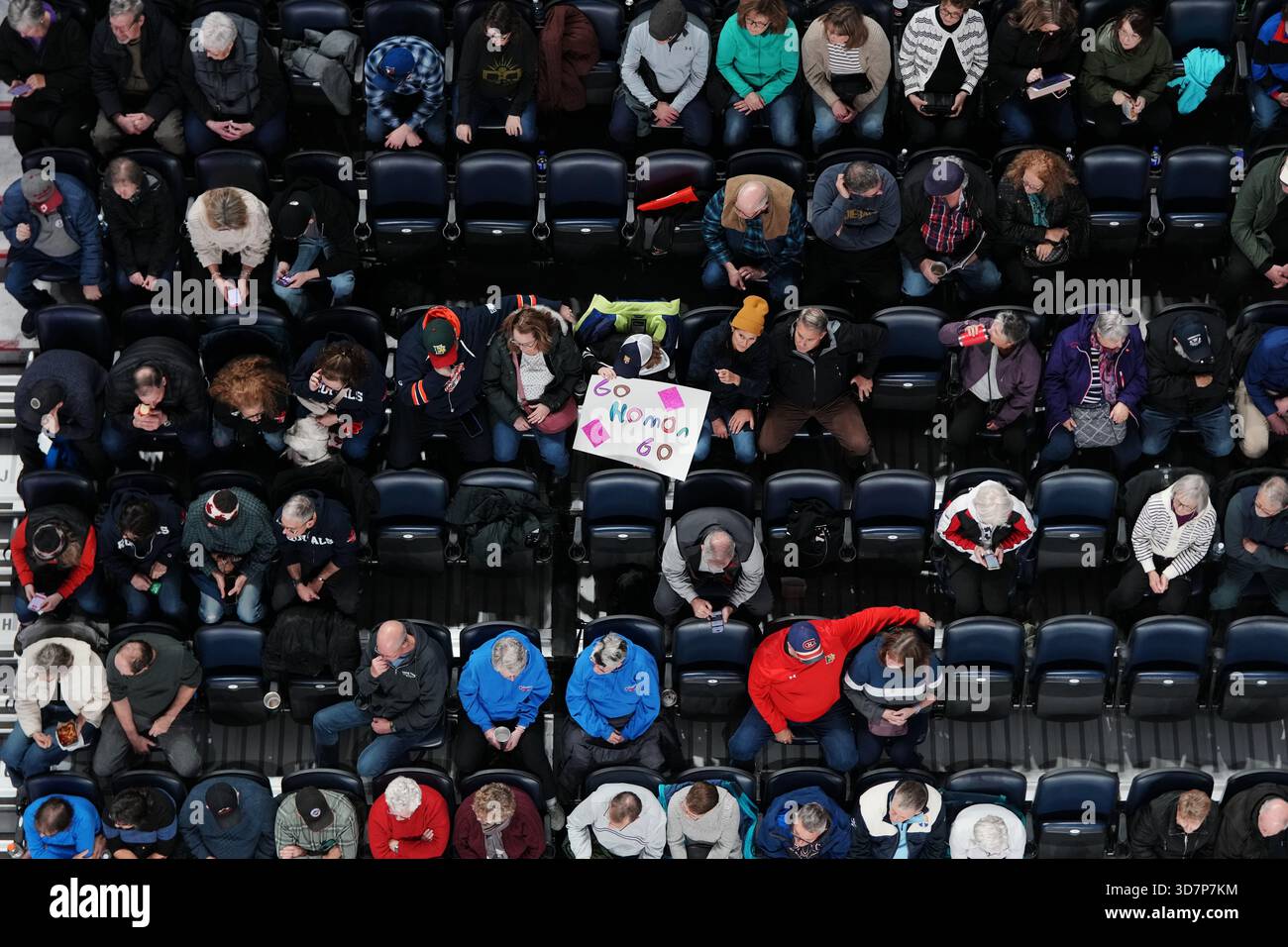 A fan holds a sign supporting Rachel Homan in the stands during ...