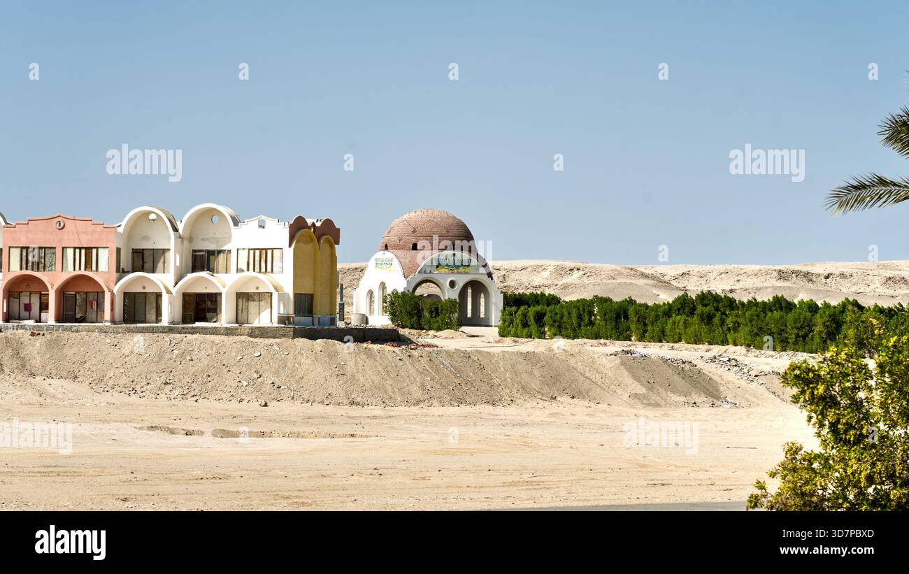Entrance gate and service buildings of an Egyptian hotel resort ...