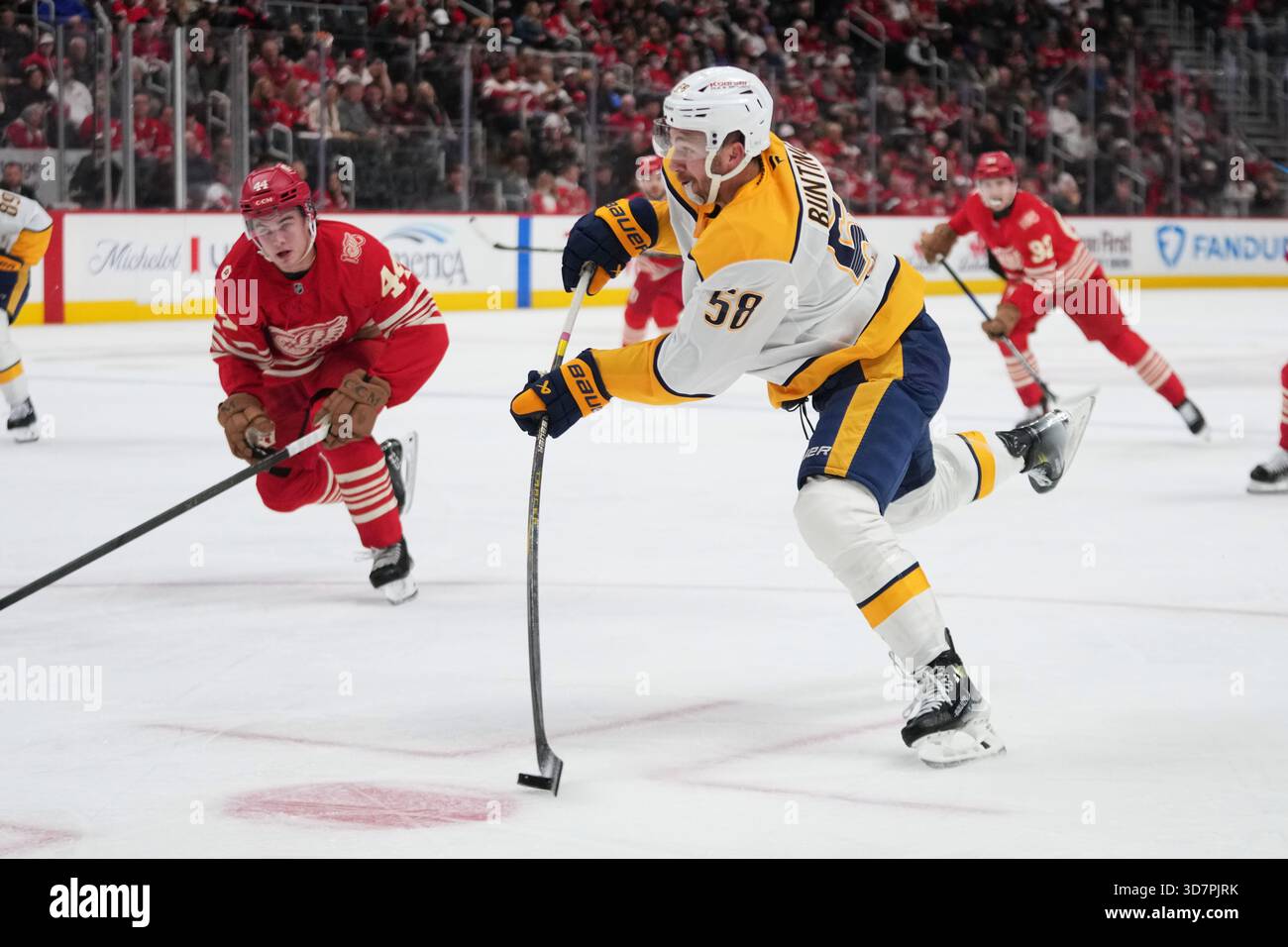 Nashville Predators left wing Michael Bunting (58) shoots as Detroit ...