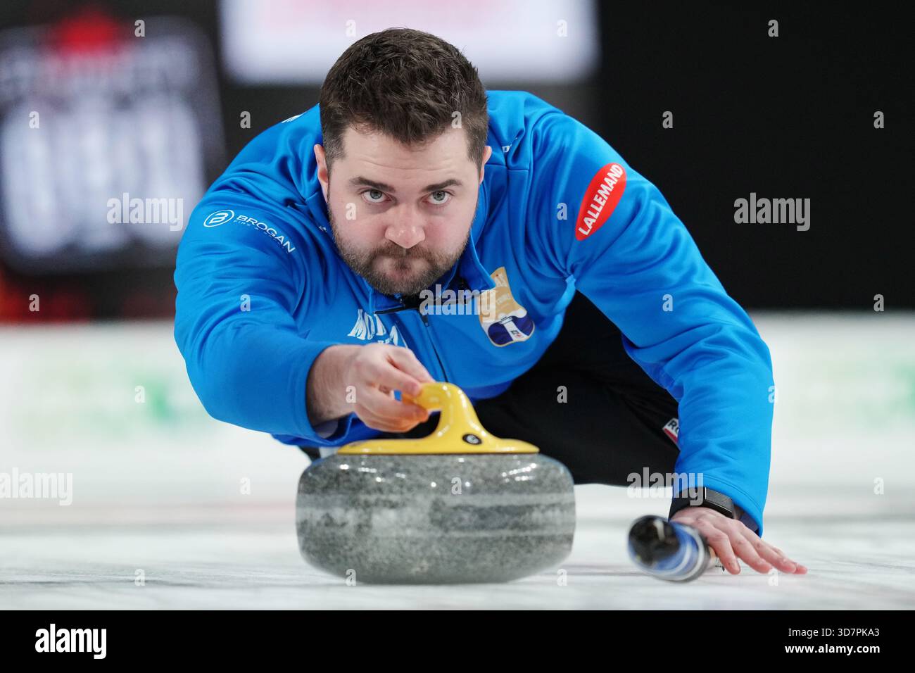 Skip Matt Dunstone delivers a stone during Canadian Olympic curling ...