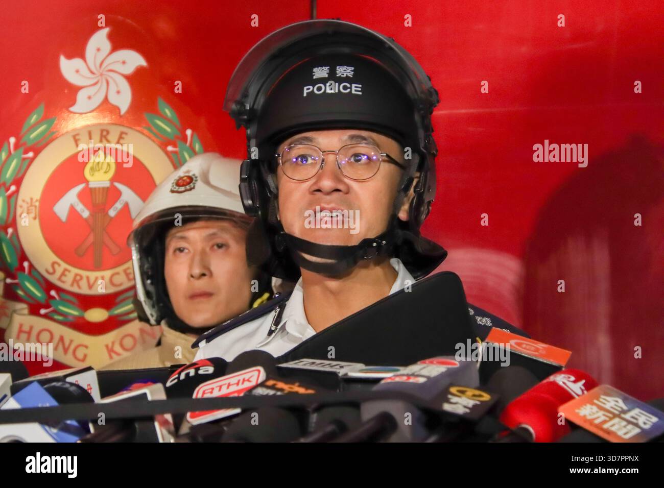 Kelvin Kong Wing-cheung, District Commander (Tai Po) of Hong Kong Police Force briefing the ...