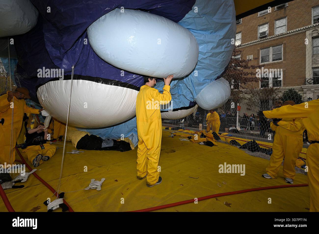 Macy's inflation team work on the 'Bluey' balloon during Macy's Balloon ...