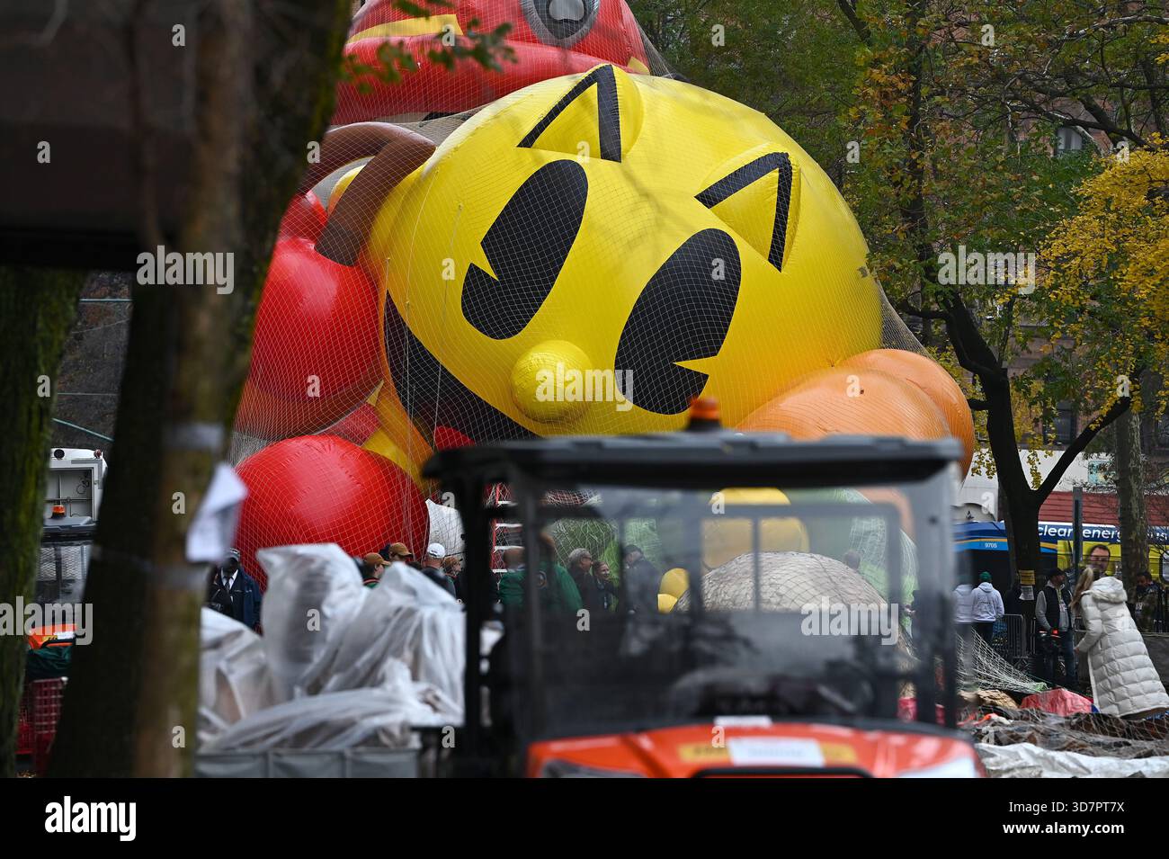 The Pac Man balloon rests under protective netting during Macy's ...