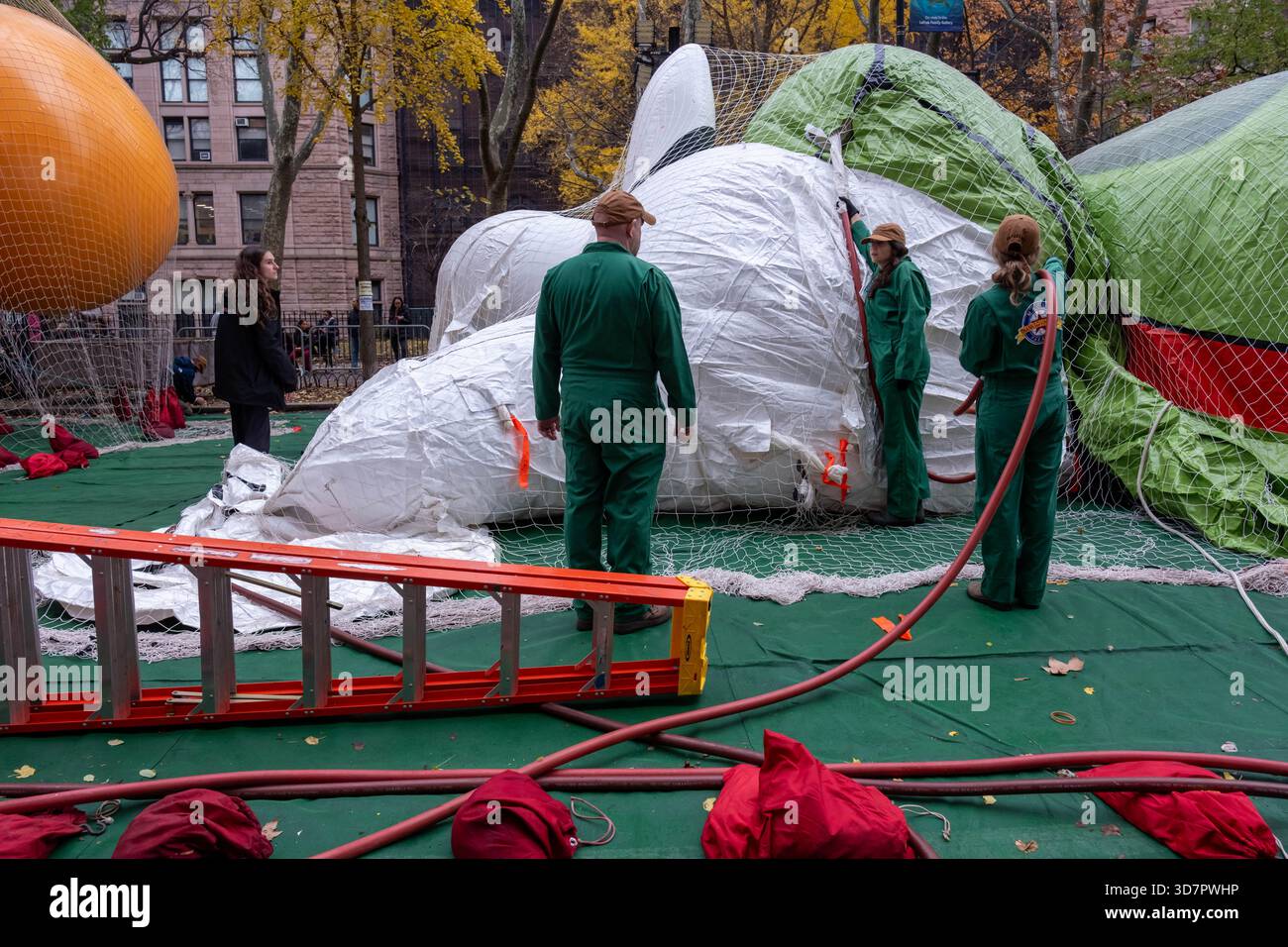New York, United States. 26th Nov, 2025. The Tech team in green works ...