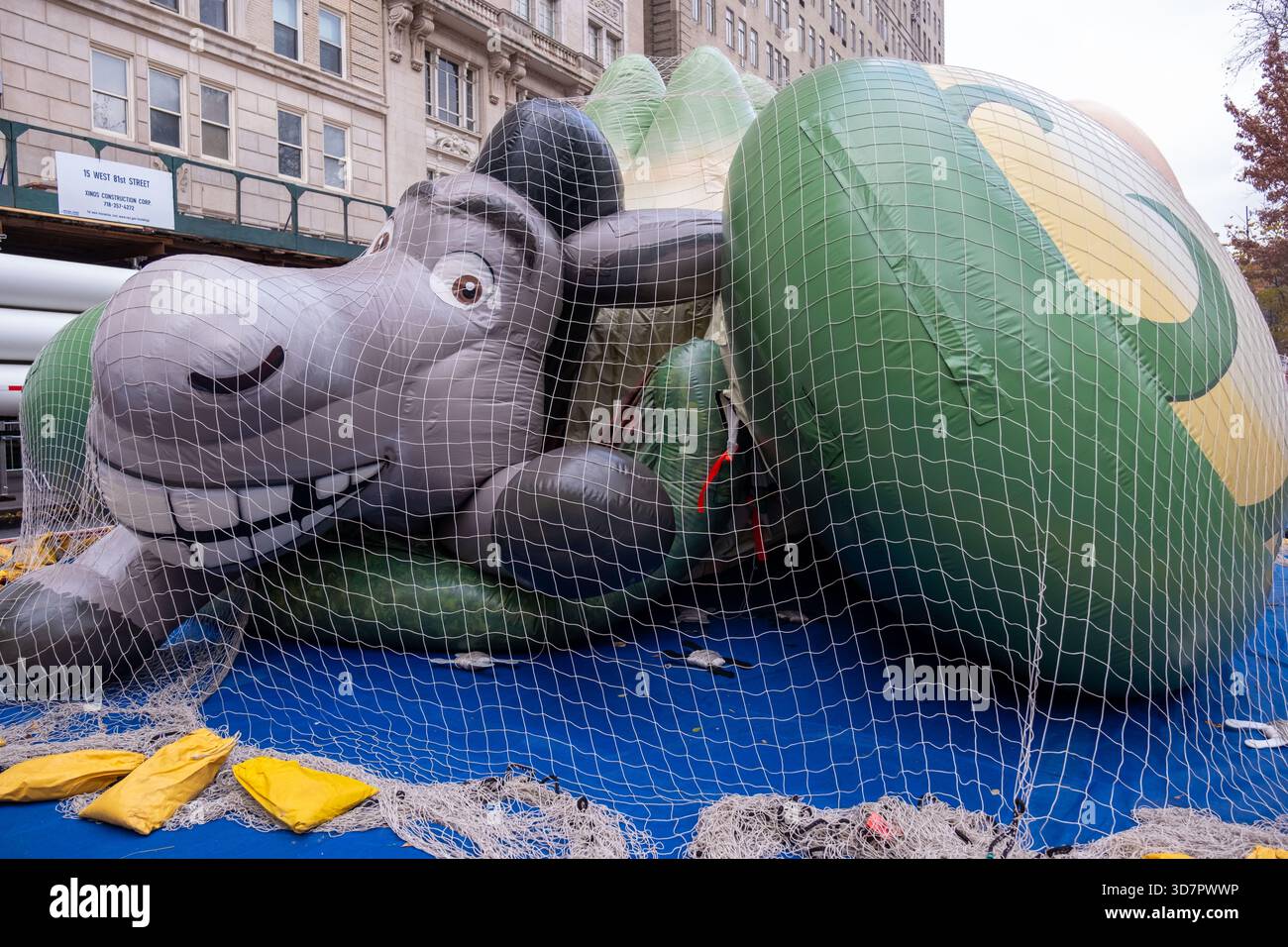 New to the parade this year, the Shrek Onion Cart balloon is seen ...