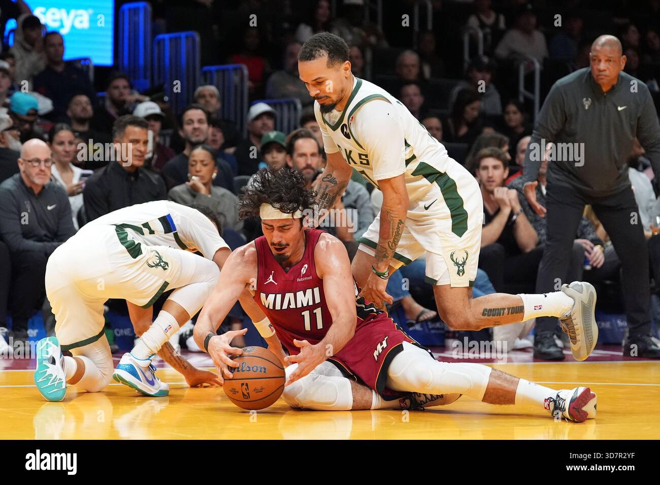 Miami Heat forward Jaime Jaquez Jr. (11) dives on a loose ball during a ...