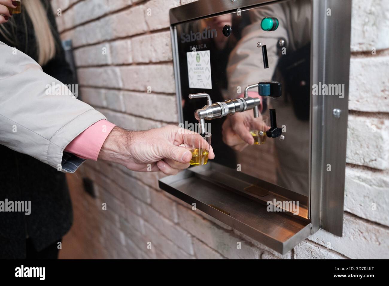Marezige, Slovenia. 26th Nov, 2025. People taste olive oil from the ...