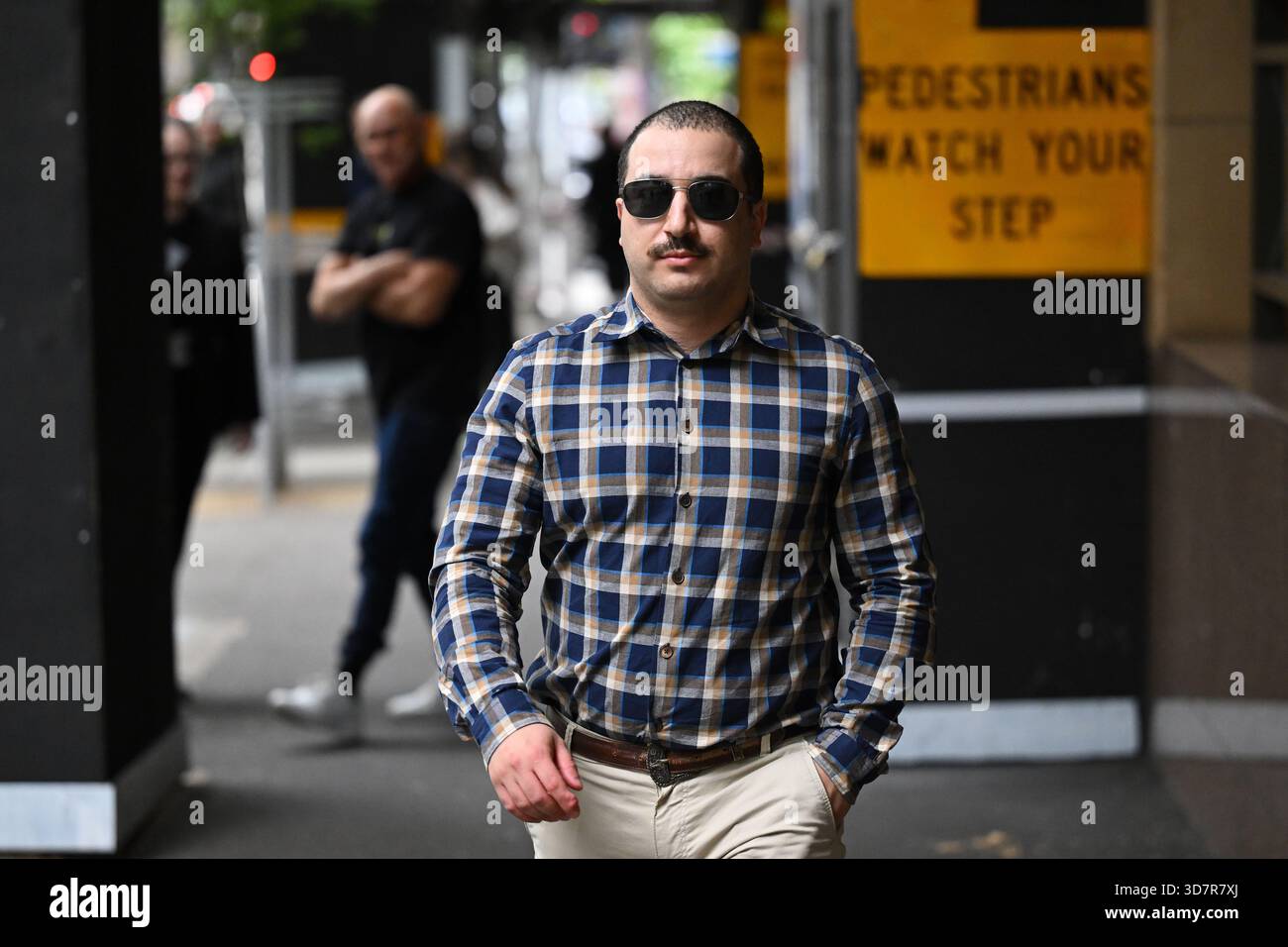 Stefan Eracleous departs from the Magistrates Court of Victoria in ...