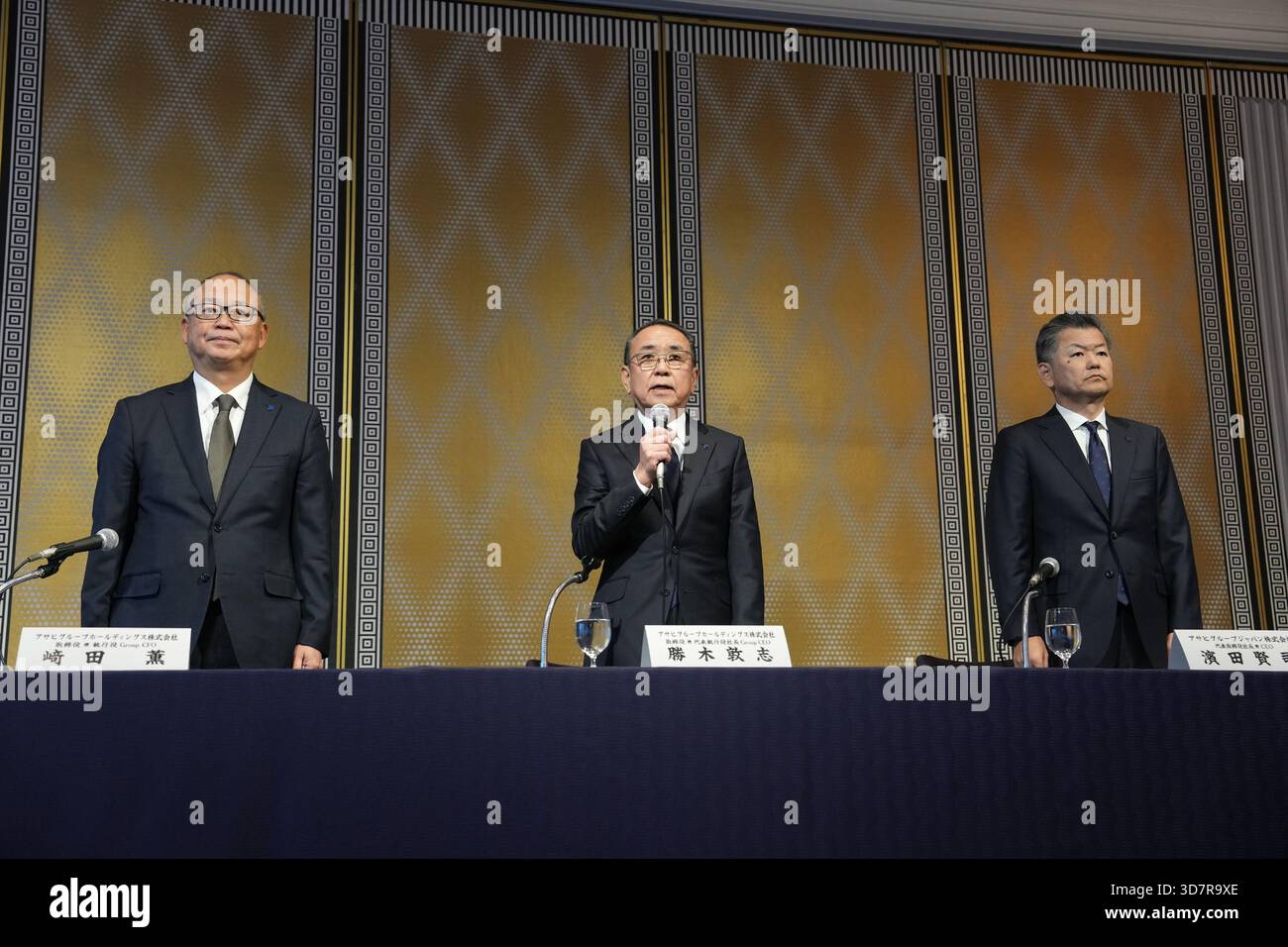 (L-R) Kaoru Sakita, Asahi Group Holdings CFO, Atsushi Katsuki, Asahi ...
