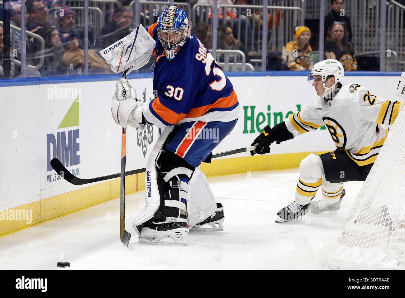New York Islanders goaltender Ilya Sorokin (30) clears the puck past ...