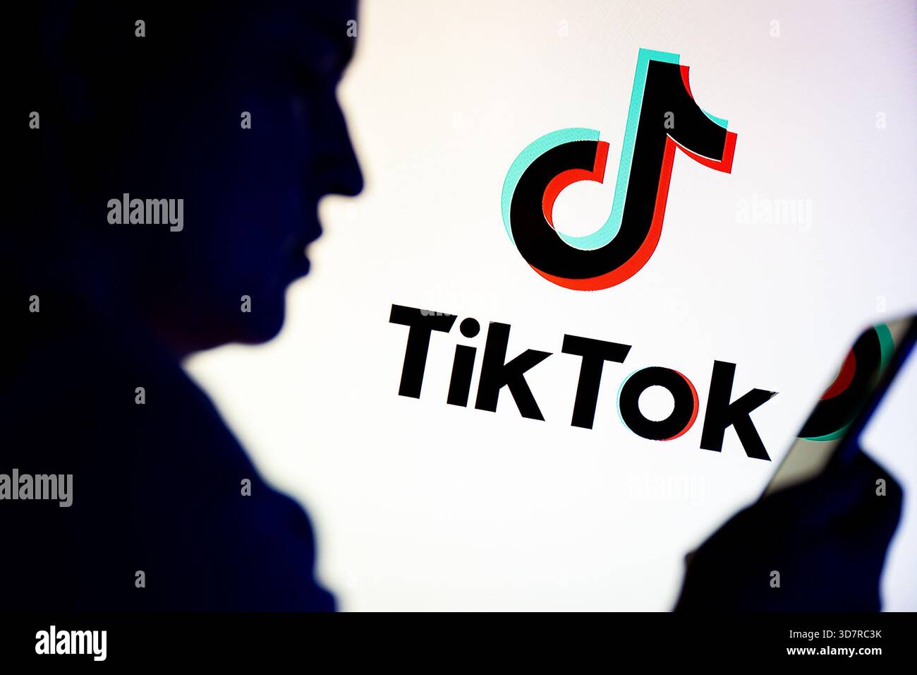 In this photo illustration, a Tik Tok logo is seen displayed on TV ...