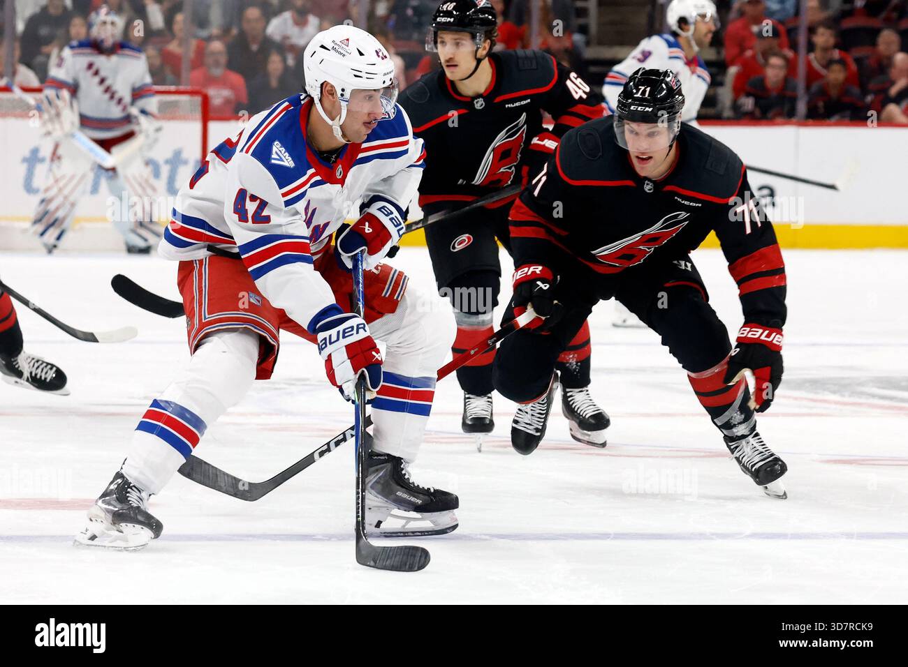 New York Rangers' Noah Laba (42) controls the puck in front of Carolina ...