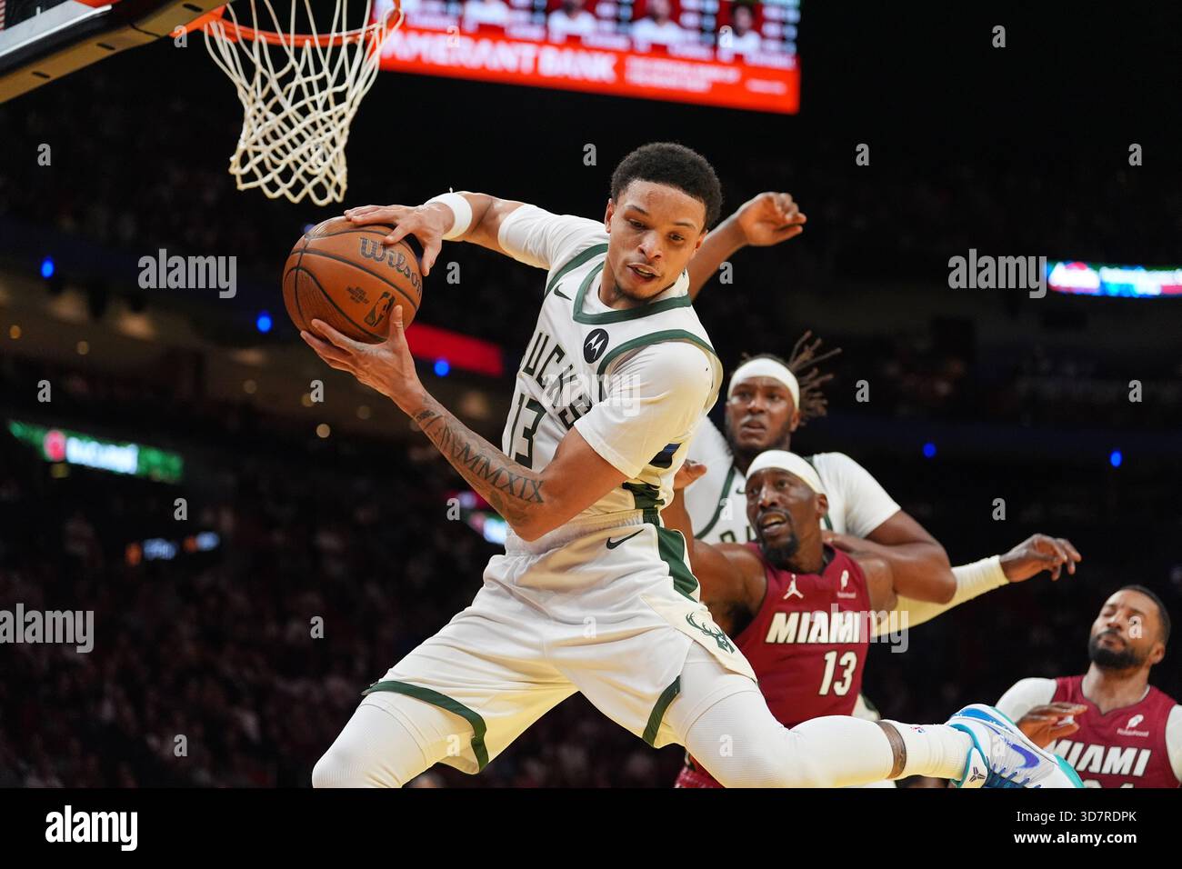 Milwaukee Bucks guard Ryan Rollins (13) snags a rebound during the ...