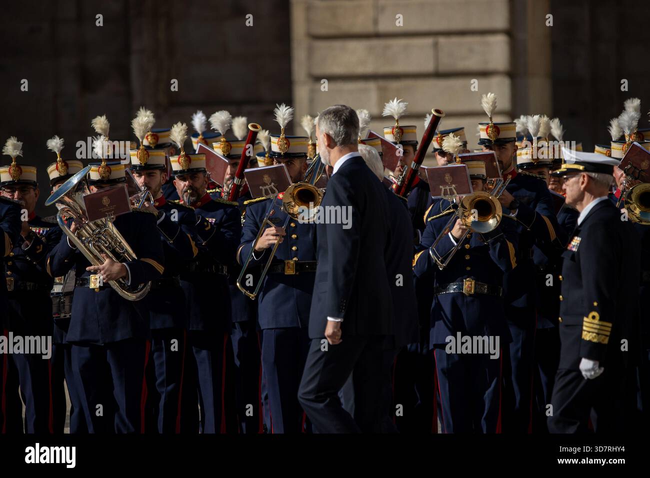 A group of Royal Guards form a line as King Felipe VI passes by during ...