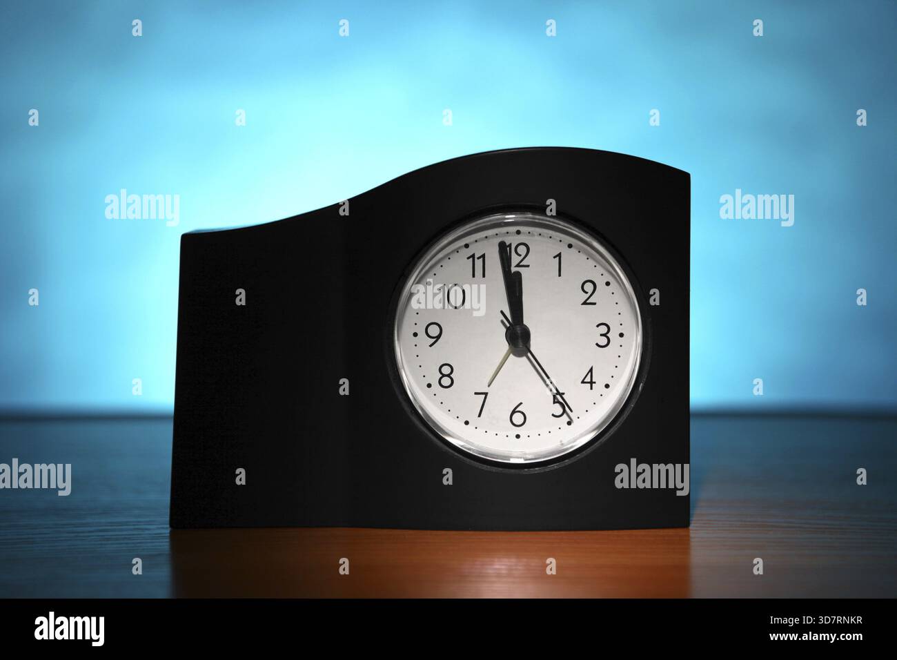 Clock in the Dark Room with display Almost Midnight Stock Photo - Alamy