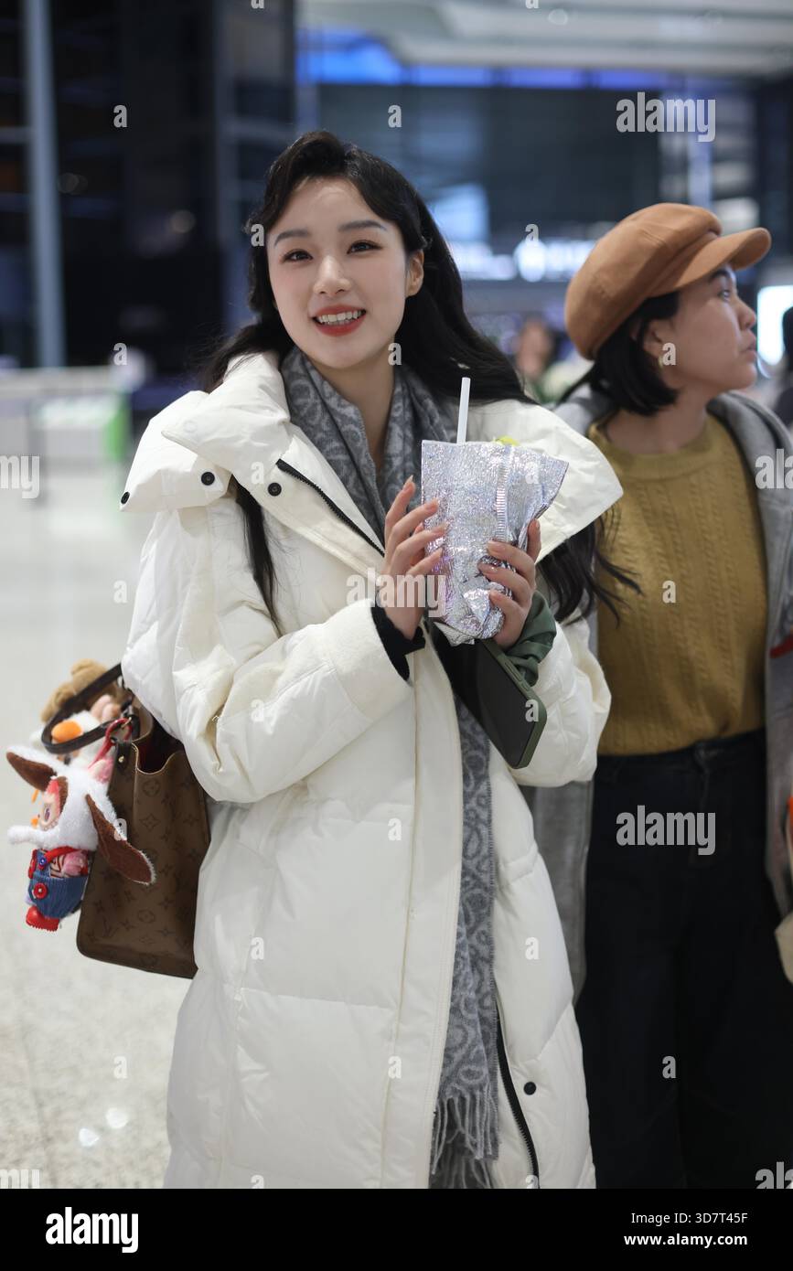 Chinese actress Wang Xiaoyi appears at the airport in Shanghai, China, 25 November, 2025 Stock ...