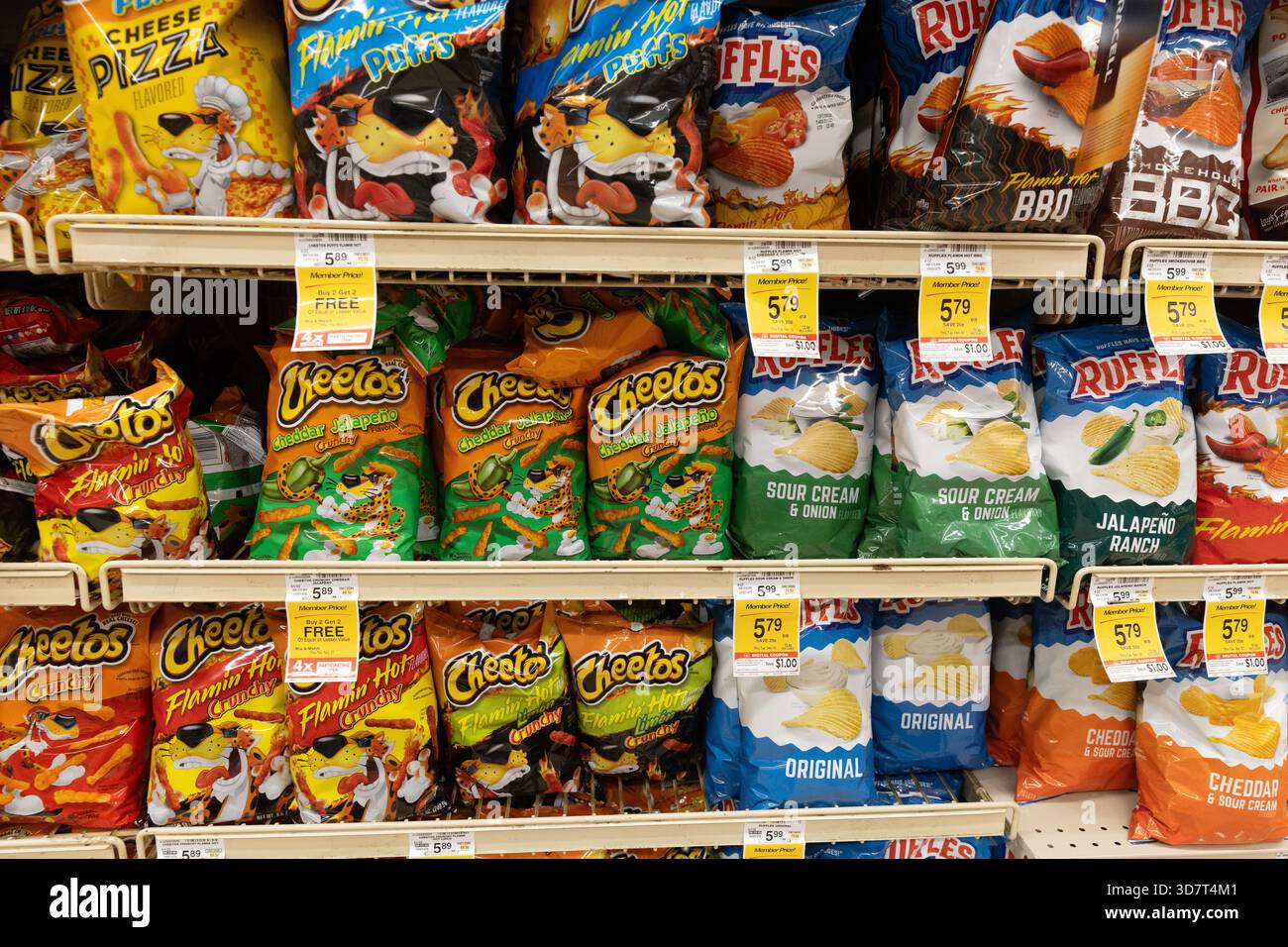 Cheetos and Ruffles Chips Displayed on Grocery Store Shelf Stock Photo ...