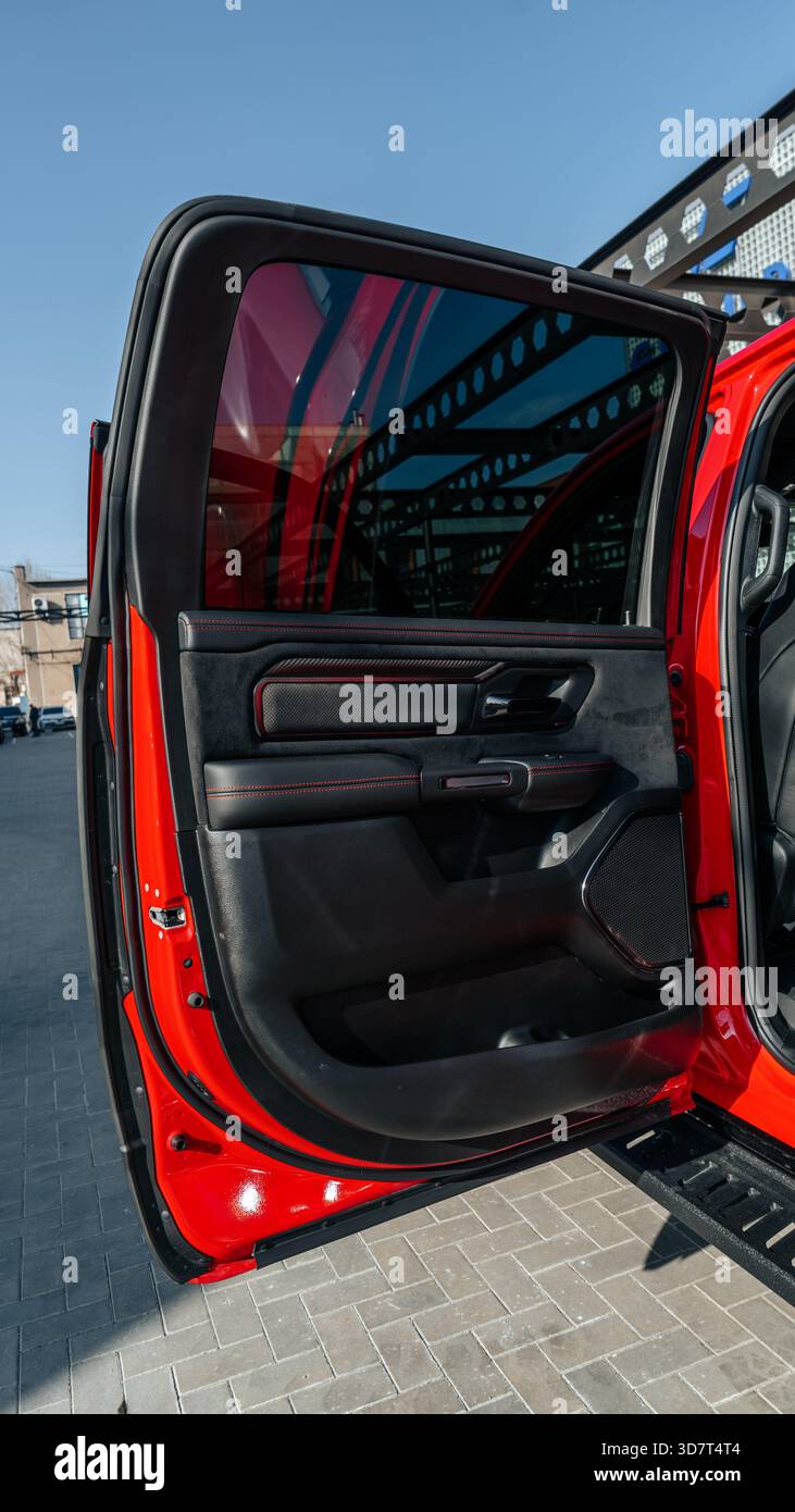 Bright red truck door open, showcasing interior design and features at ...