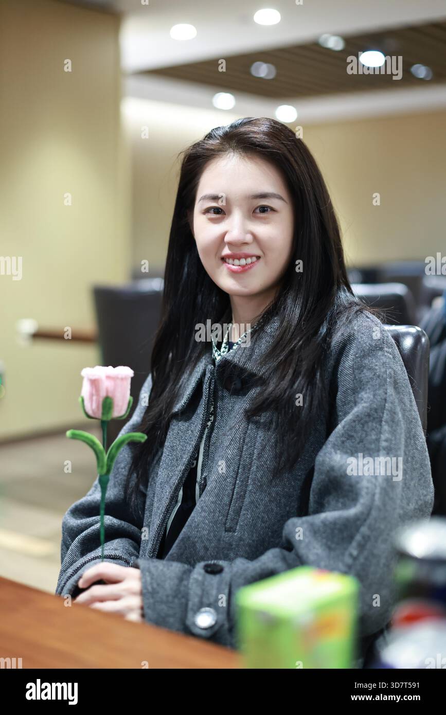 Chinese actress Guo Yuxin appears at the airport in Hangzhou City, east ...