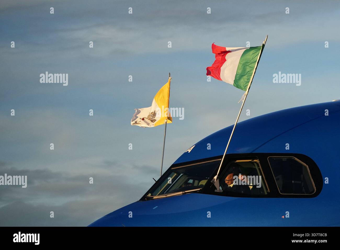 The Vatican and Italian flags wave on the airplane taking Pope Leo XIV ...