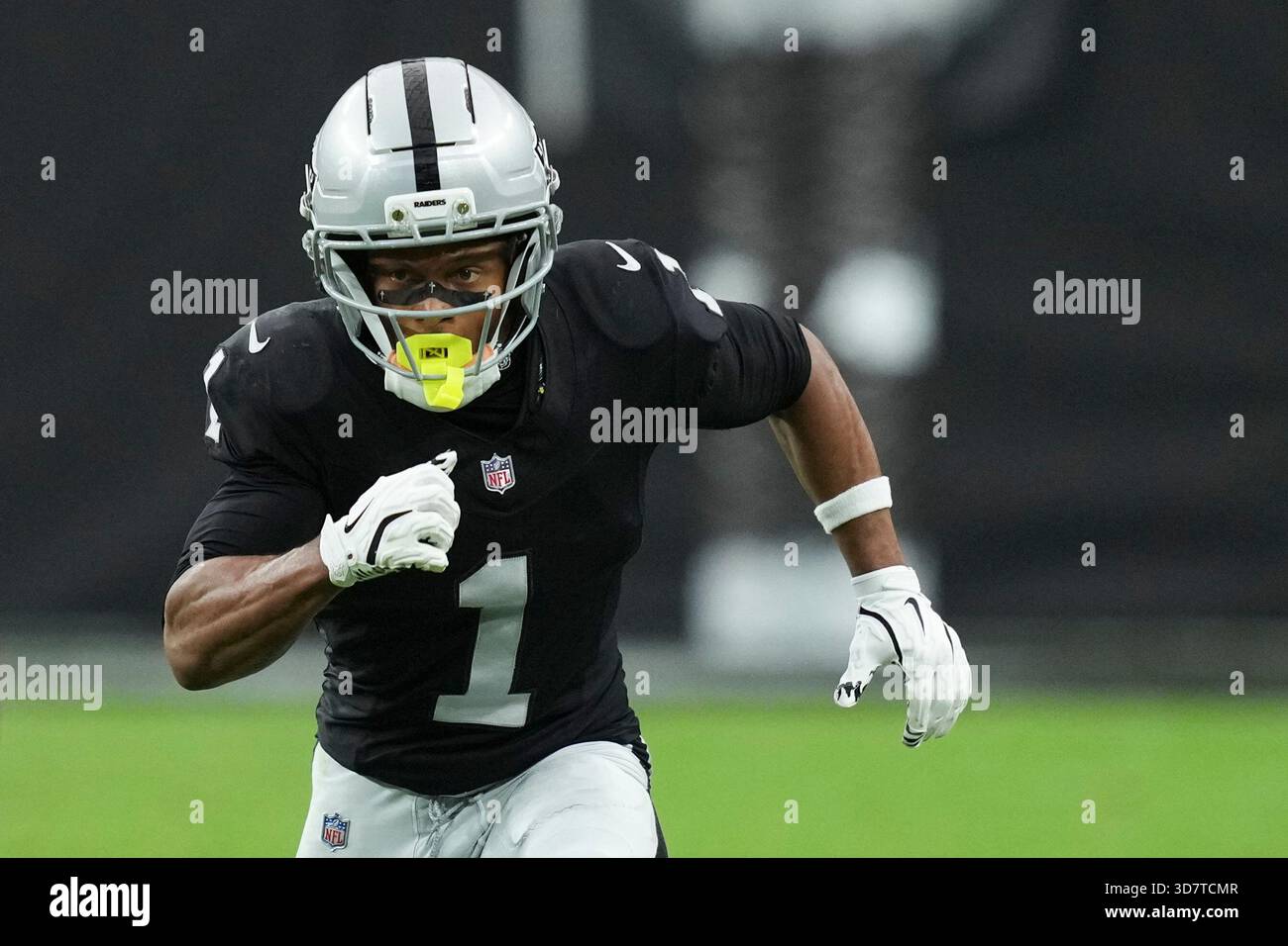 Las Vegas Raiders wide receiver Tre Tucker (1) runs during a play ...