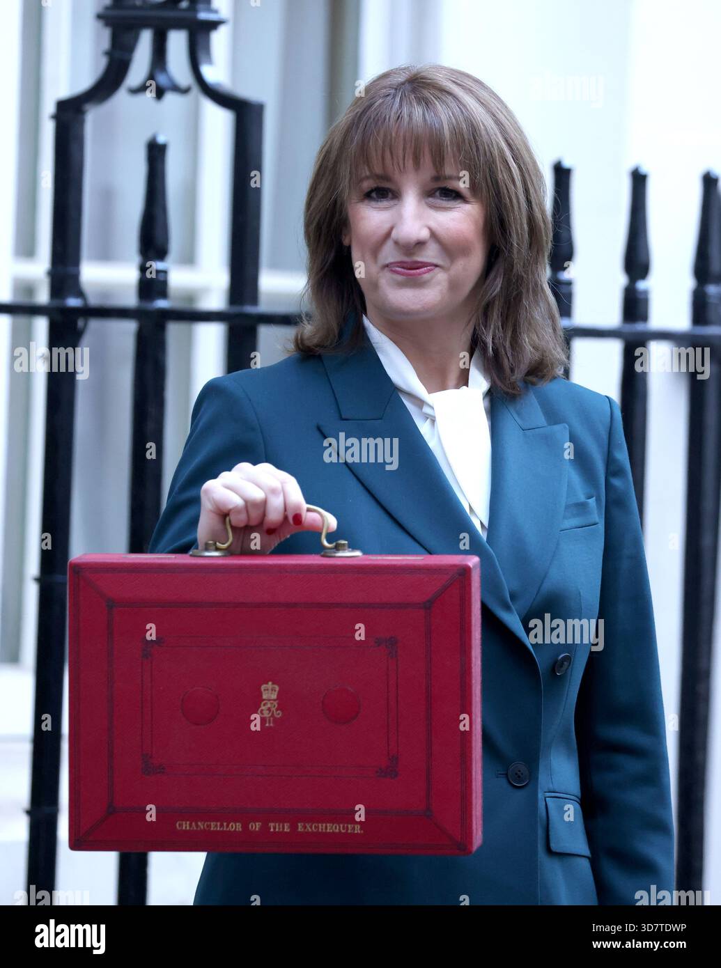Rachel Reeves, the Chancellor of the Exchequer, stands outside Number ...