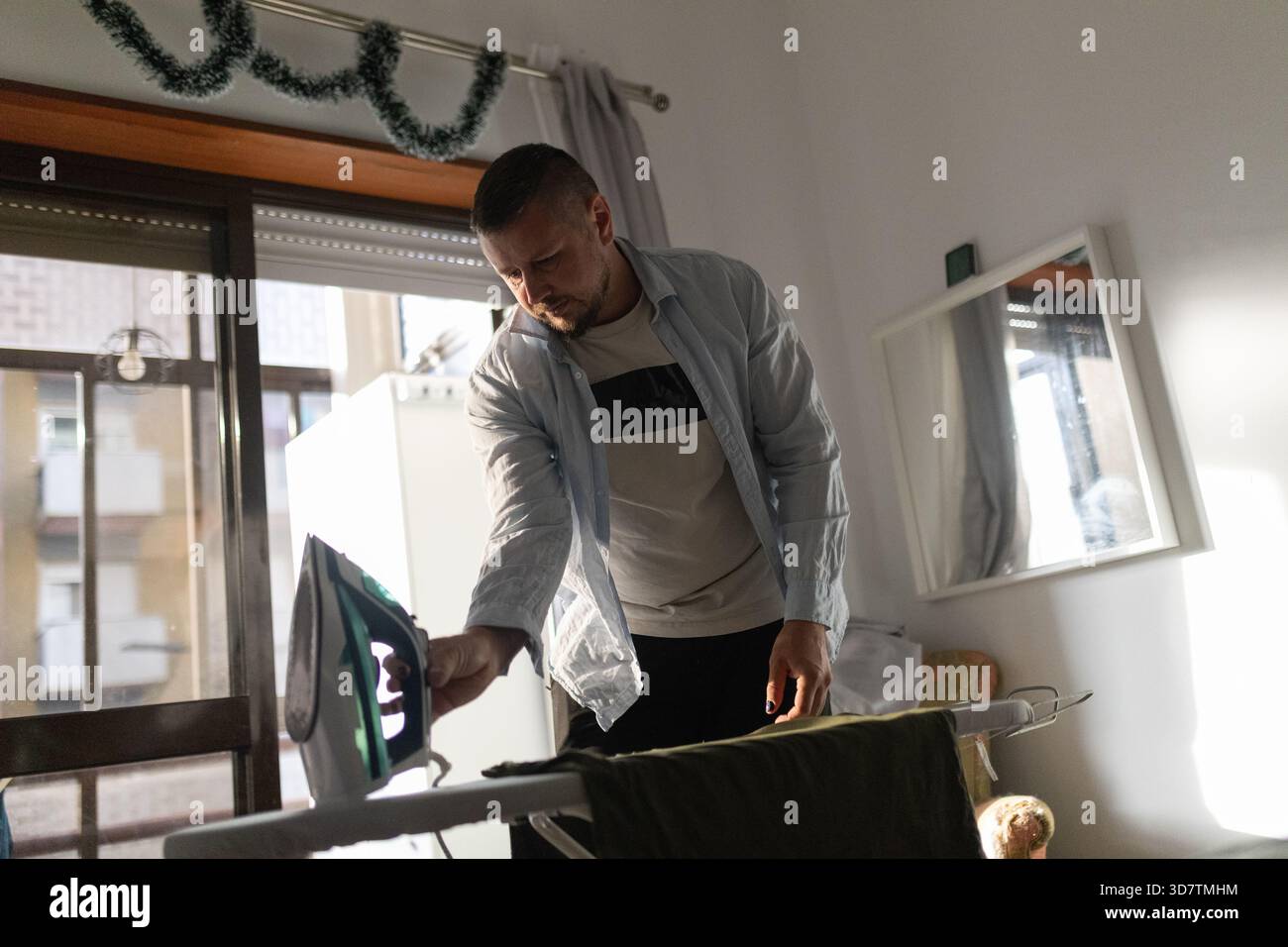 Man performing chores hi-res stock photography and images - Alamy