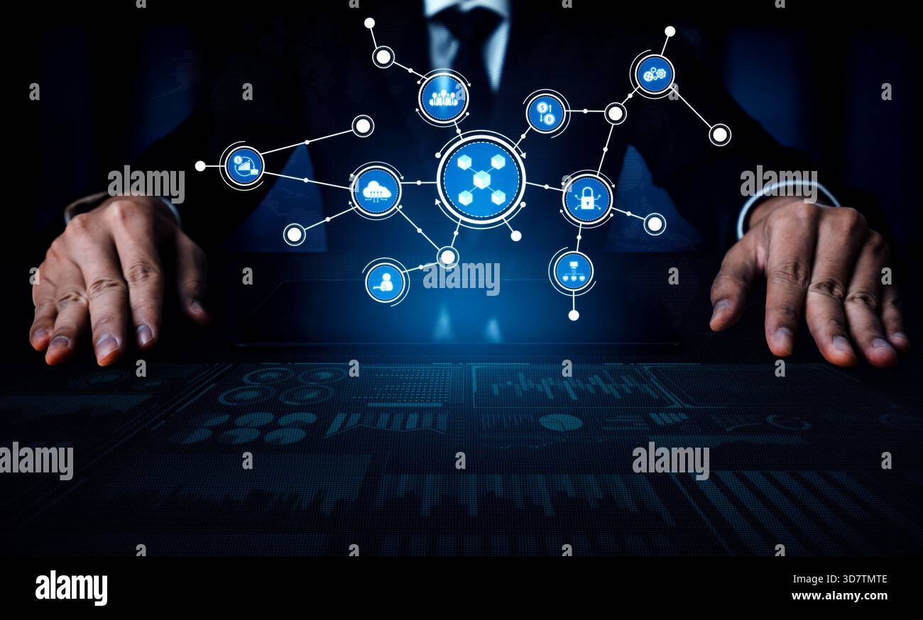 A businessman engages with a digital network interface, showcasing ...