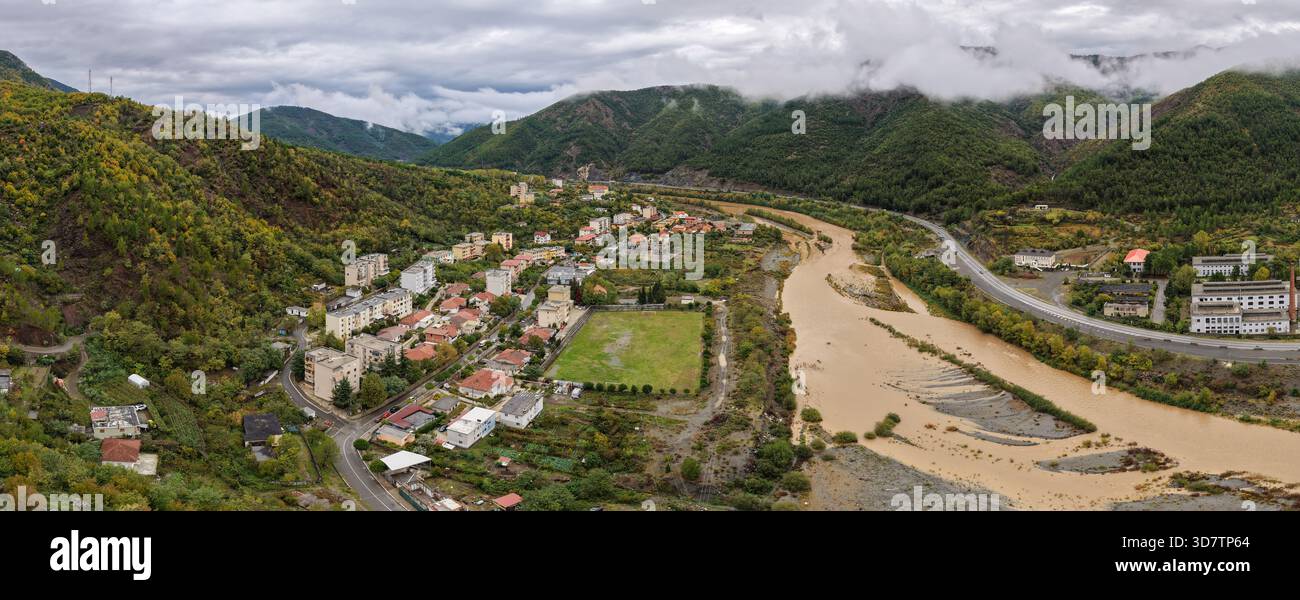 Panoramic drone view of Rubik town surrounded by autumn forests ...