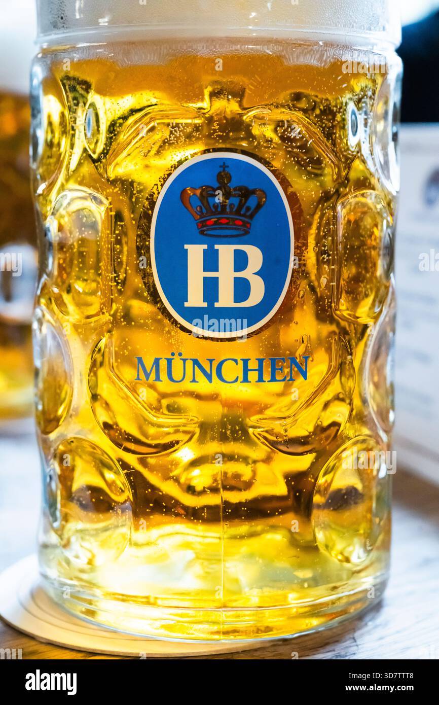 A stein filled with one litre of lager beer from the Hofbräuhaus Munich ...