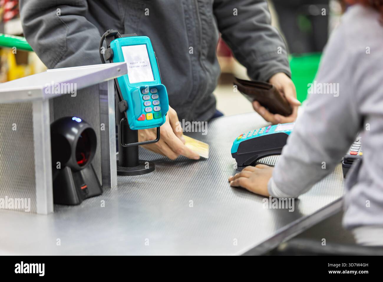 African american cashier point hi-res stock photography and images - Alamy