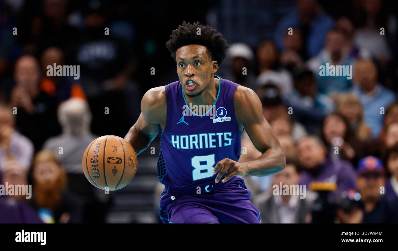 Charlotte Hornets guard Collin Sexton pushes the ball upcourt during ...