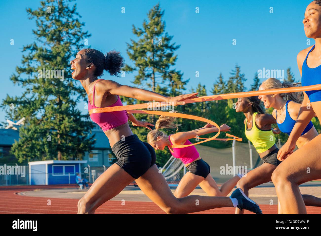 Athletes sprinting across finish hi-res stock photography and images ...