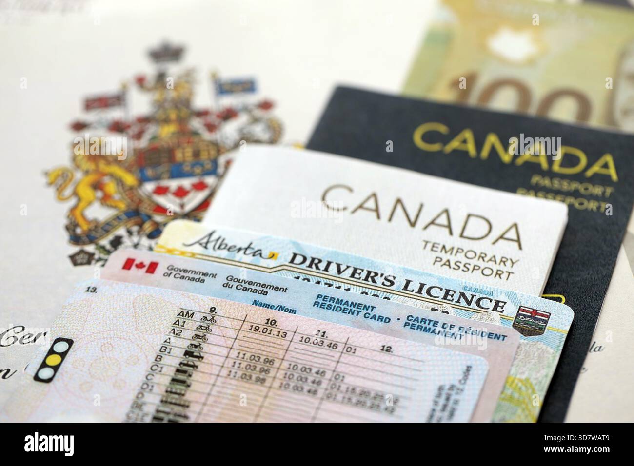 Canadian documents on certificate of citizenship close up. Passports ...
