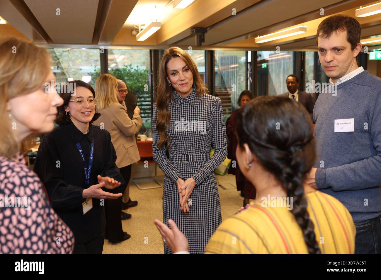 Britain's Kate, Princess of Wales, centre, visits the children's mental ...