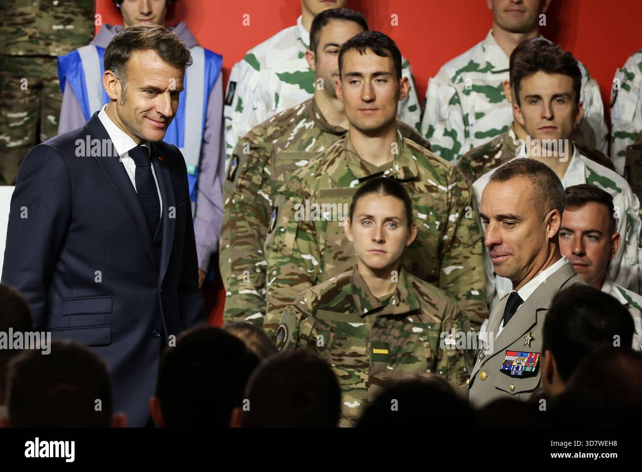 France's President Emmanuel Macron meets members of the military after unveiling a new national ...