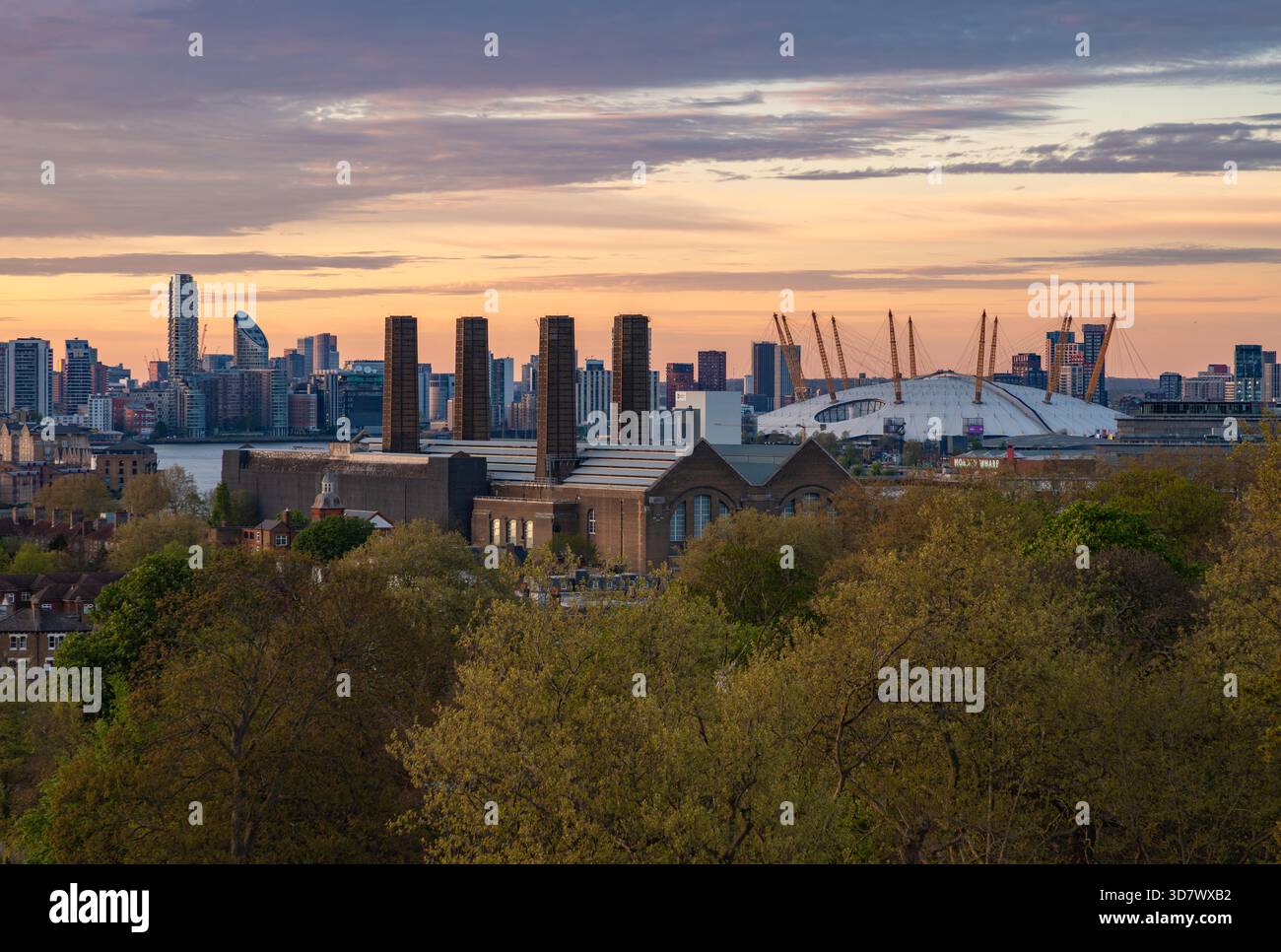A picture of the Greenwich Power Station and the O2 Arena at sunset ...