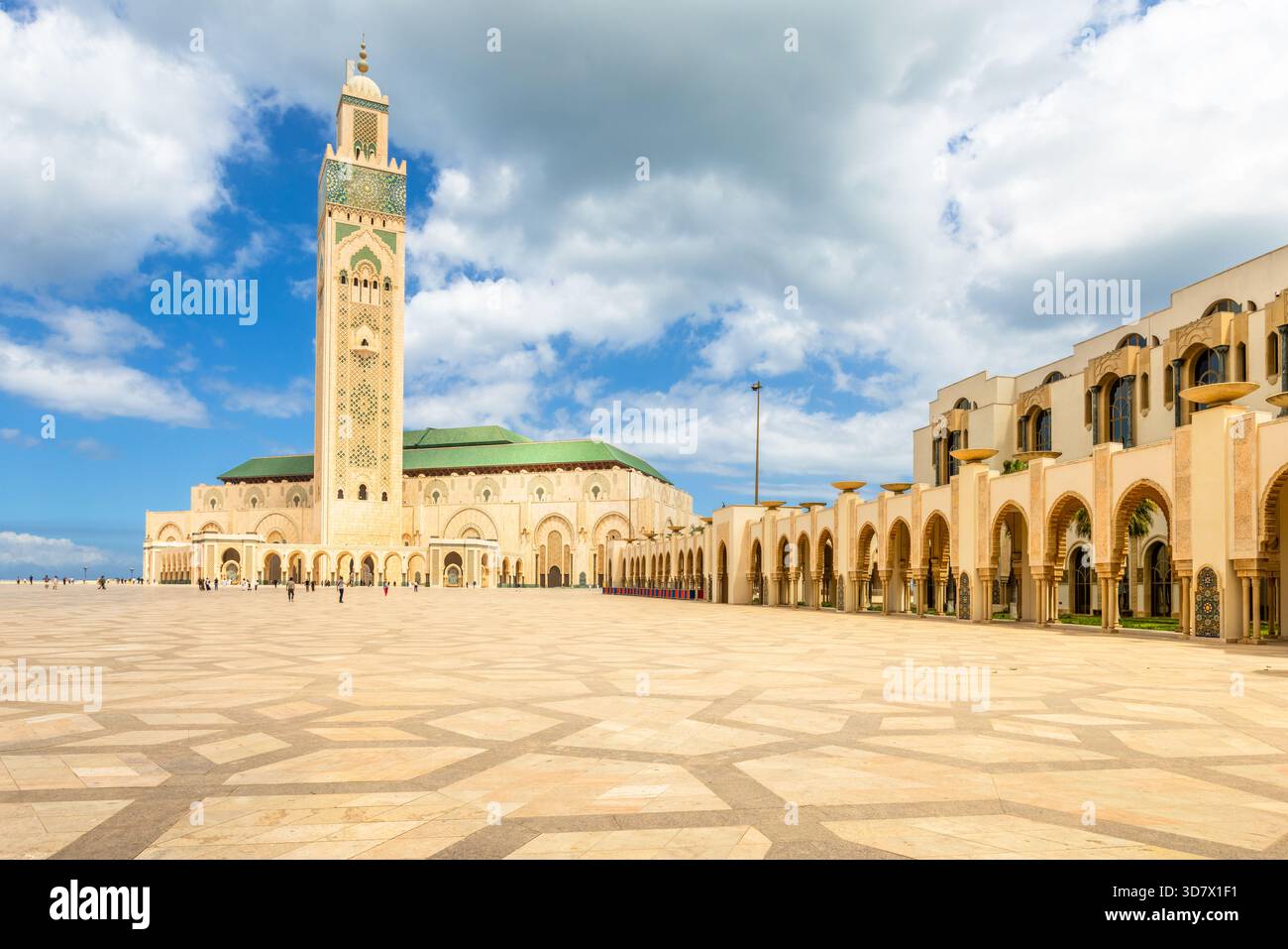 Large open square with the Hassan II Mosque, tall minaret, arched ...
