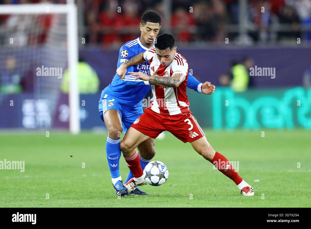 Francisco Ortega of Olympiacos and Jude Bellingham of Real Madrid ...