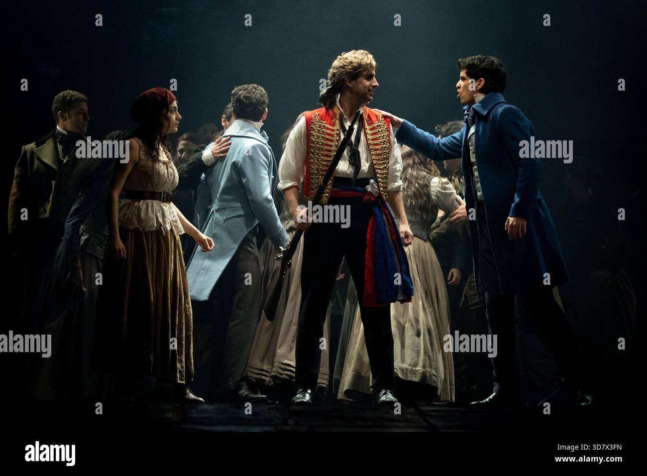 Cast members perform during the press preview of Los Miserables, el ...