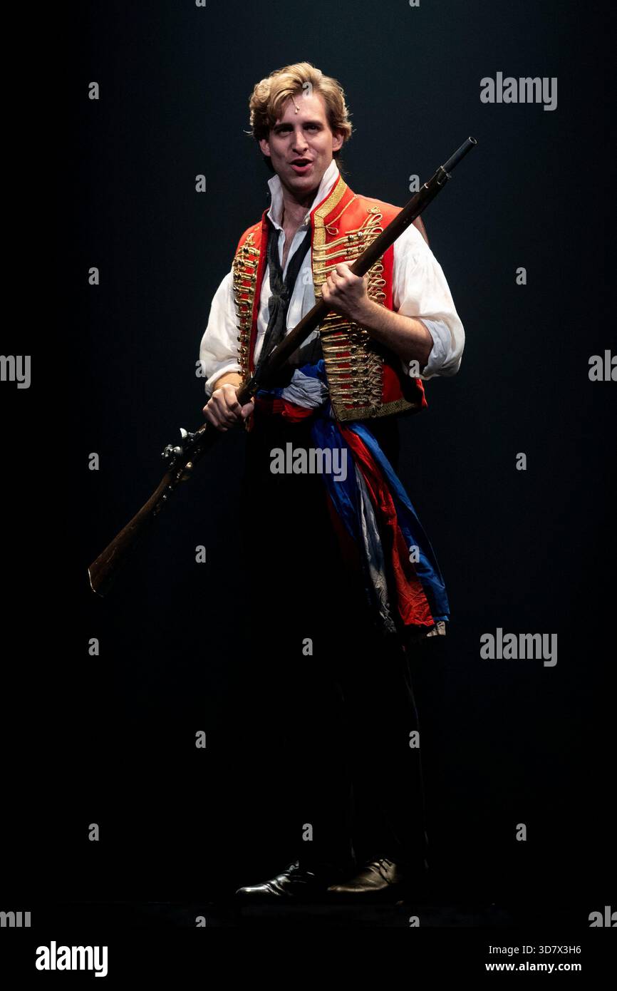 Cast members perform during the press preview of Los Miserables, el ...