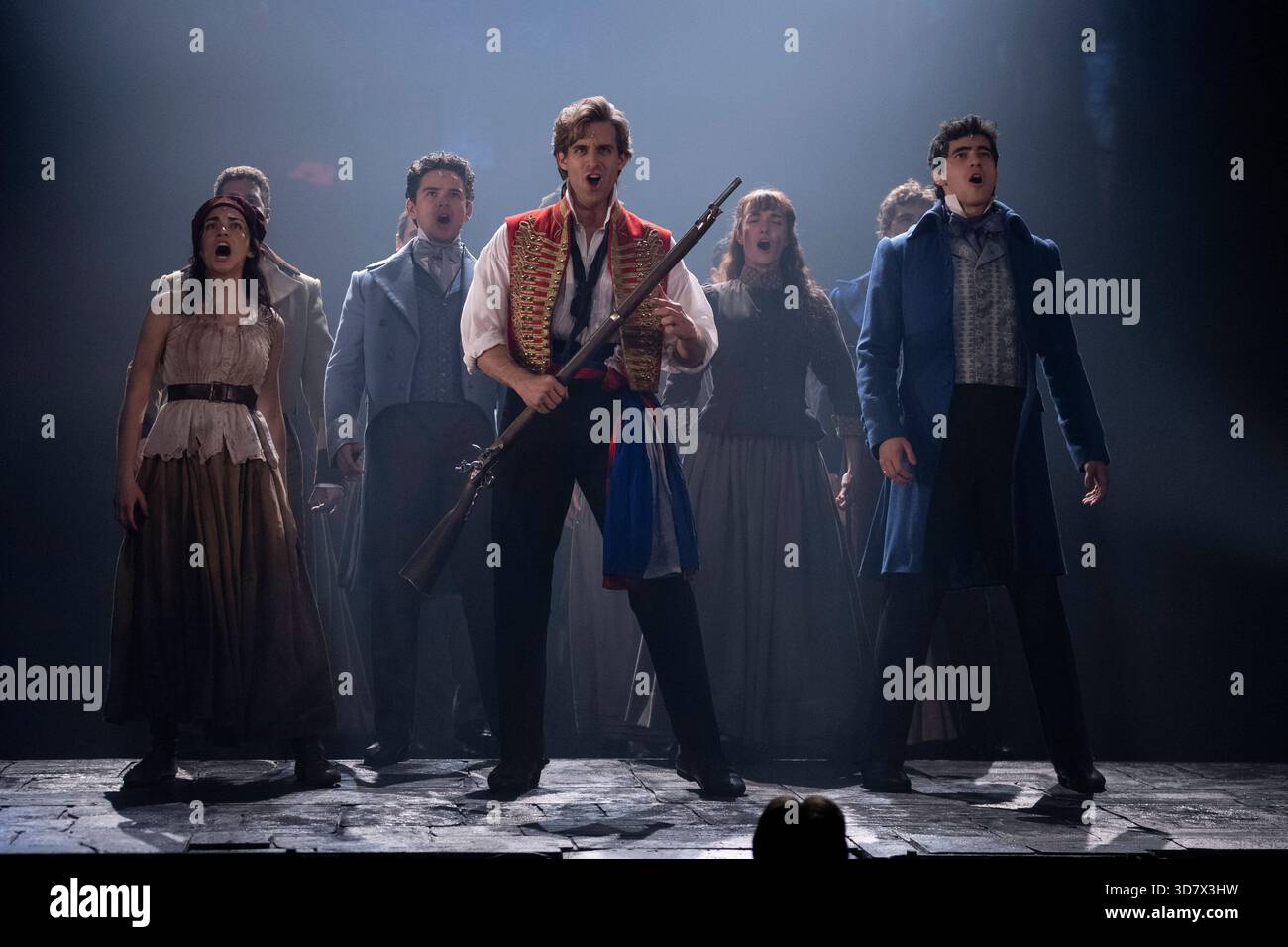 Cast members perform during the press preview of Los Miserables, el ...