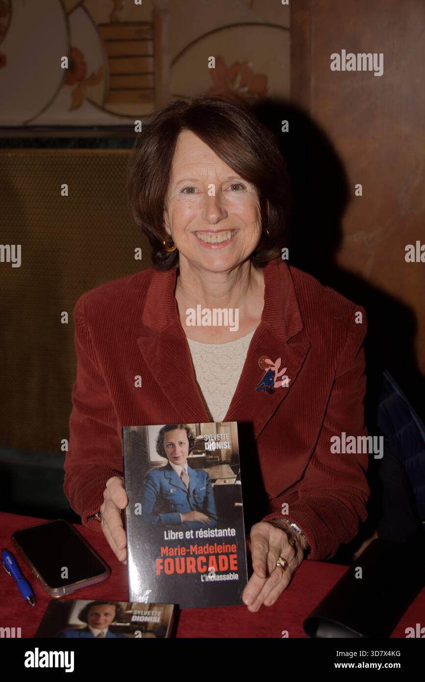 Paris, France. 26th Nov, 2025. Sylvette Dionisi presents his book ...