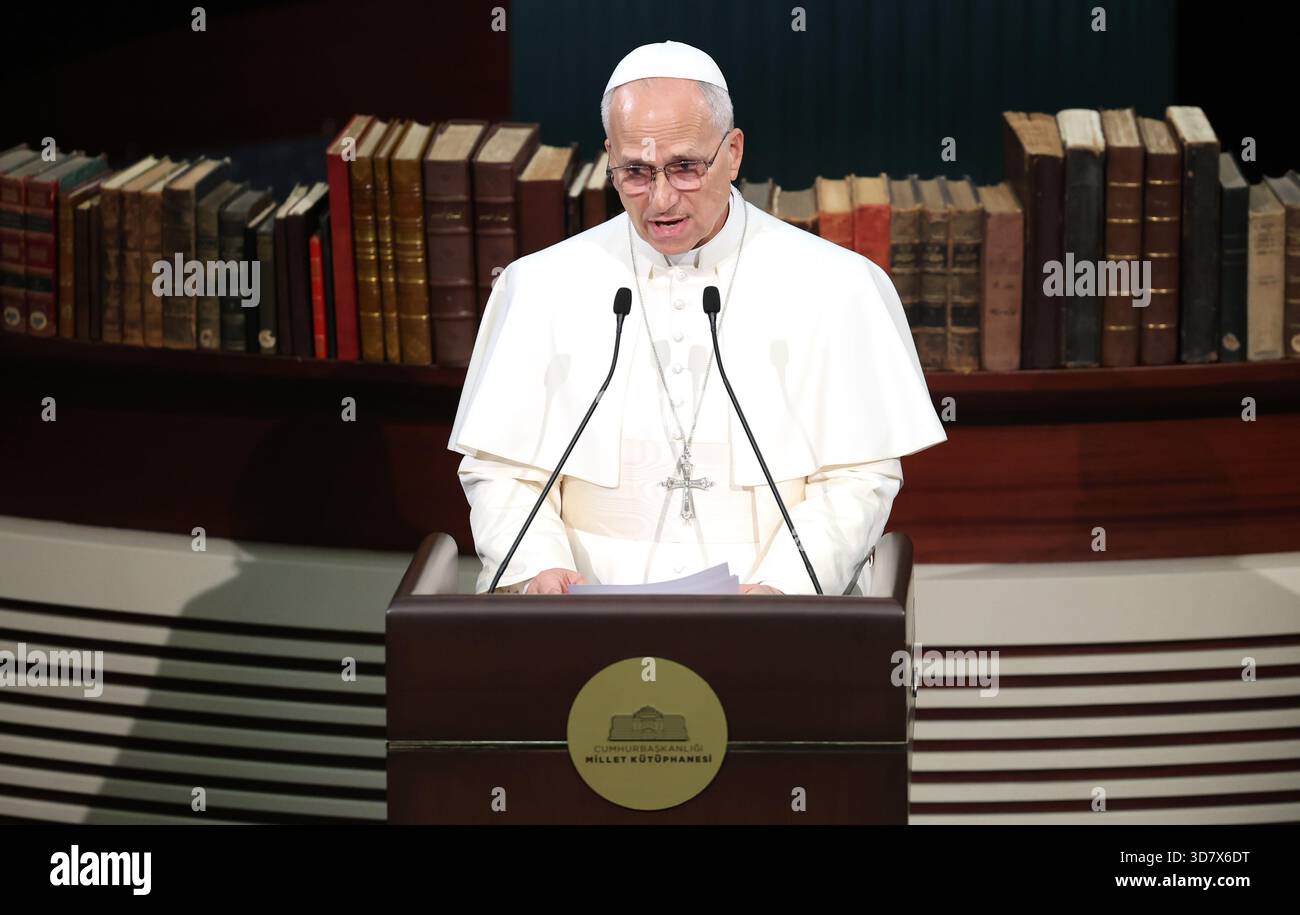 Pope Leo XIV delivers his speech as he meets with authorities, members ...