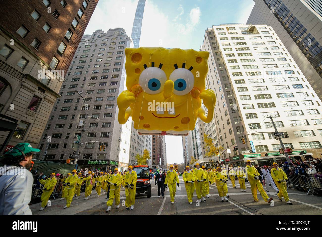 Balloon handlers guid the Sponge Bob Square Pants balloon down Sixth ...