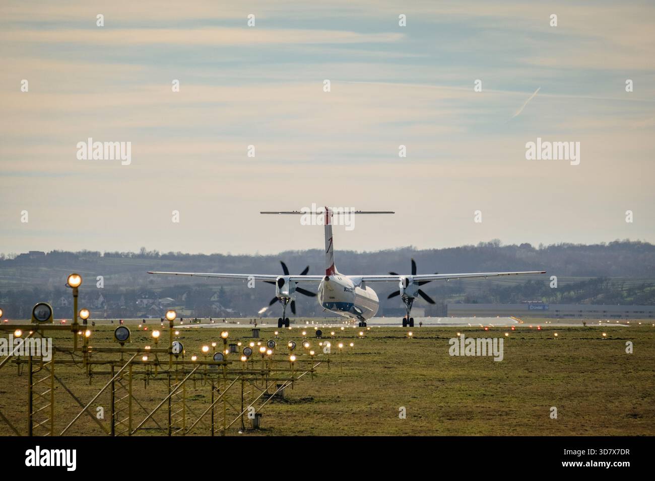 Propeller passenger aircraft preparing for takeoff at the start of the ...