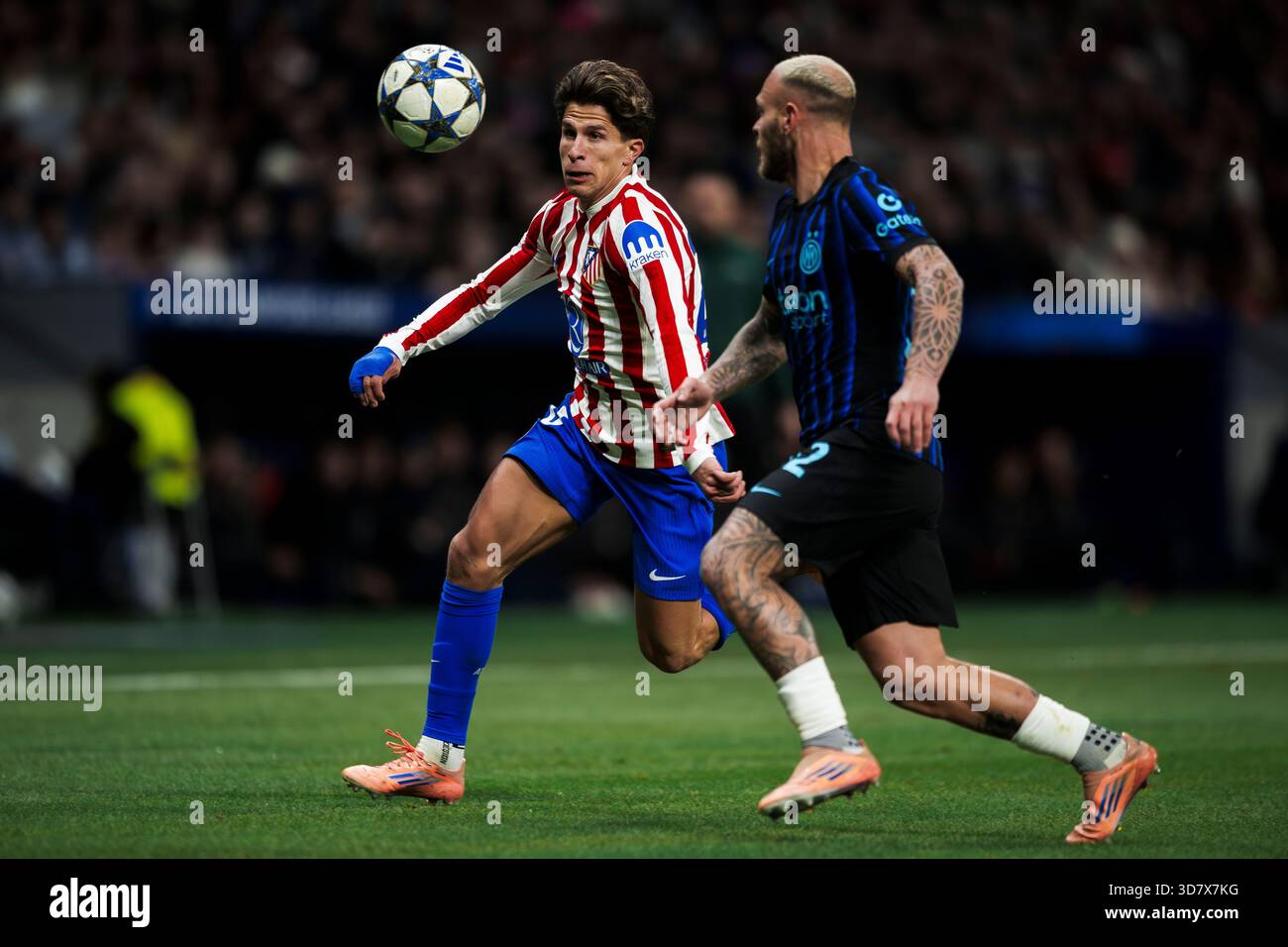 Giuliano Simeone of Club Atletico de Madrid competes for the ball with ...