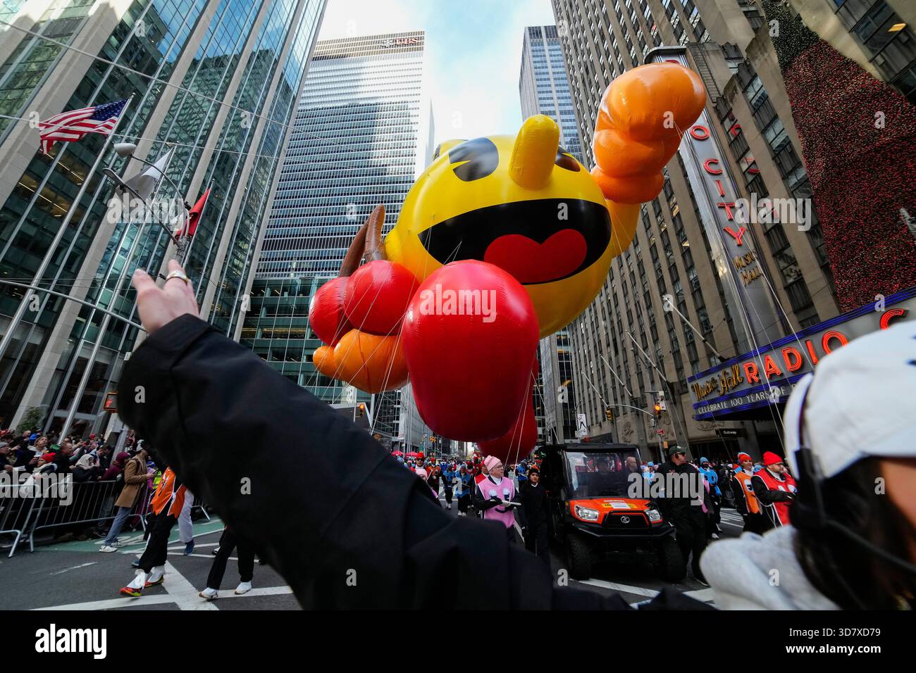 The Pac Man balloon floats down Sixth Avenue during the Macy's Thanksgiving Day Parade, Thursday ...