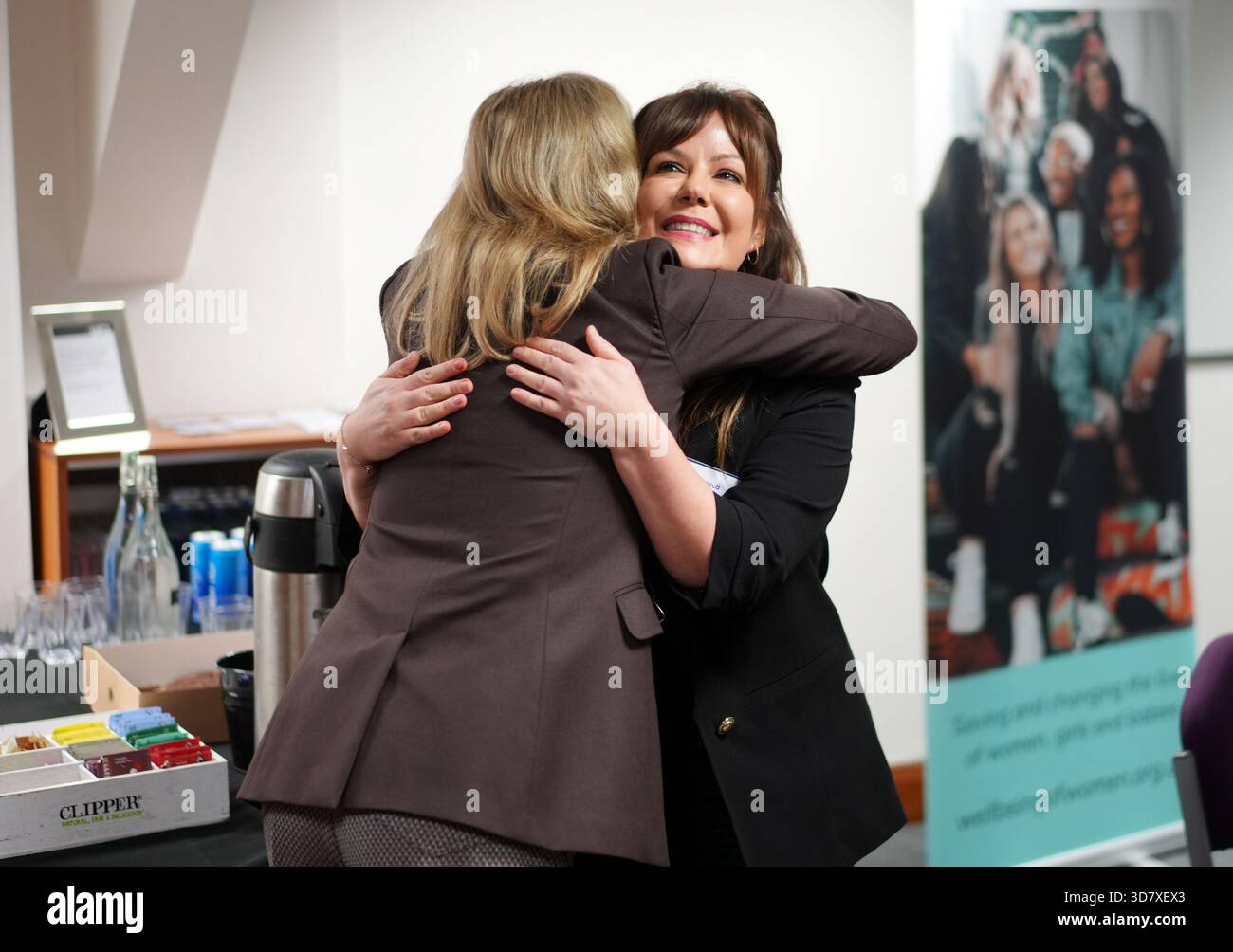 The Duchess of Edinburgh gives patient Francesca Liasides a hug during ...