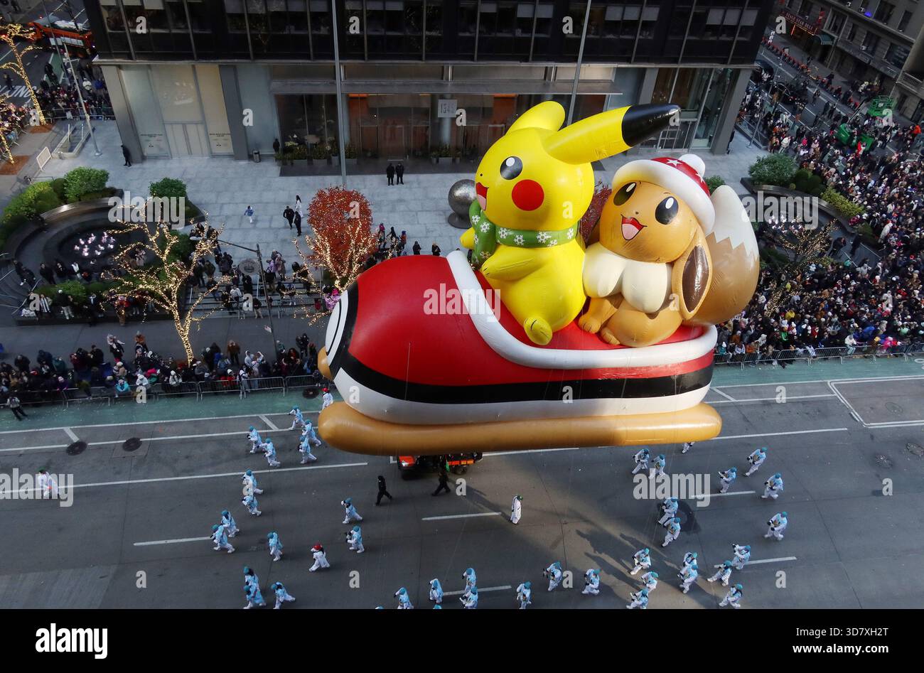 The Pikachu and Eevee balloon makes its way down the parade route as ...